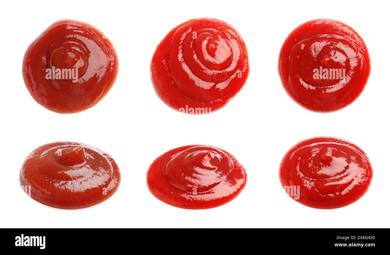 Set of tasty ketchup drops on white background, top and side views ...
