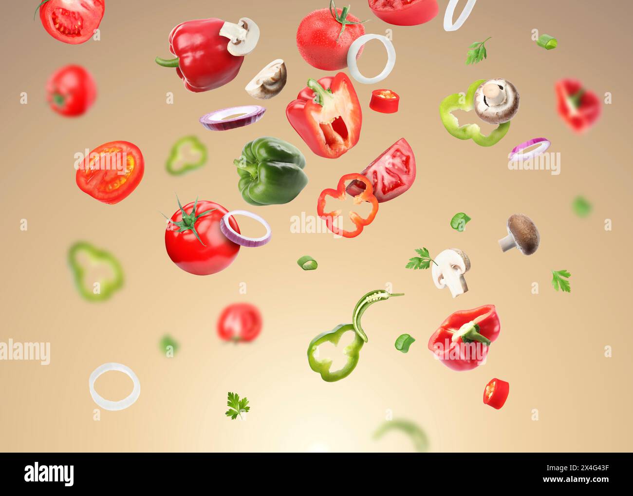 Different fresh vegetables in air on beige background Stock Photo - Alamy