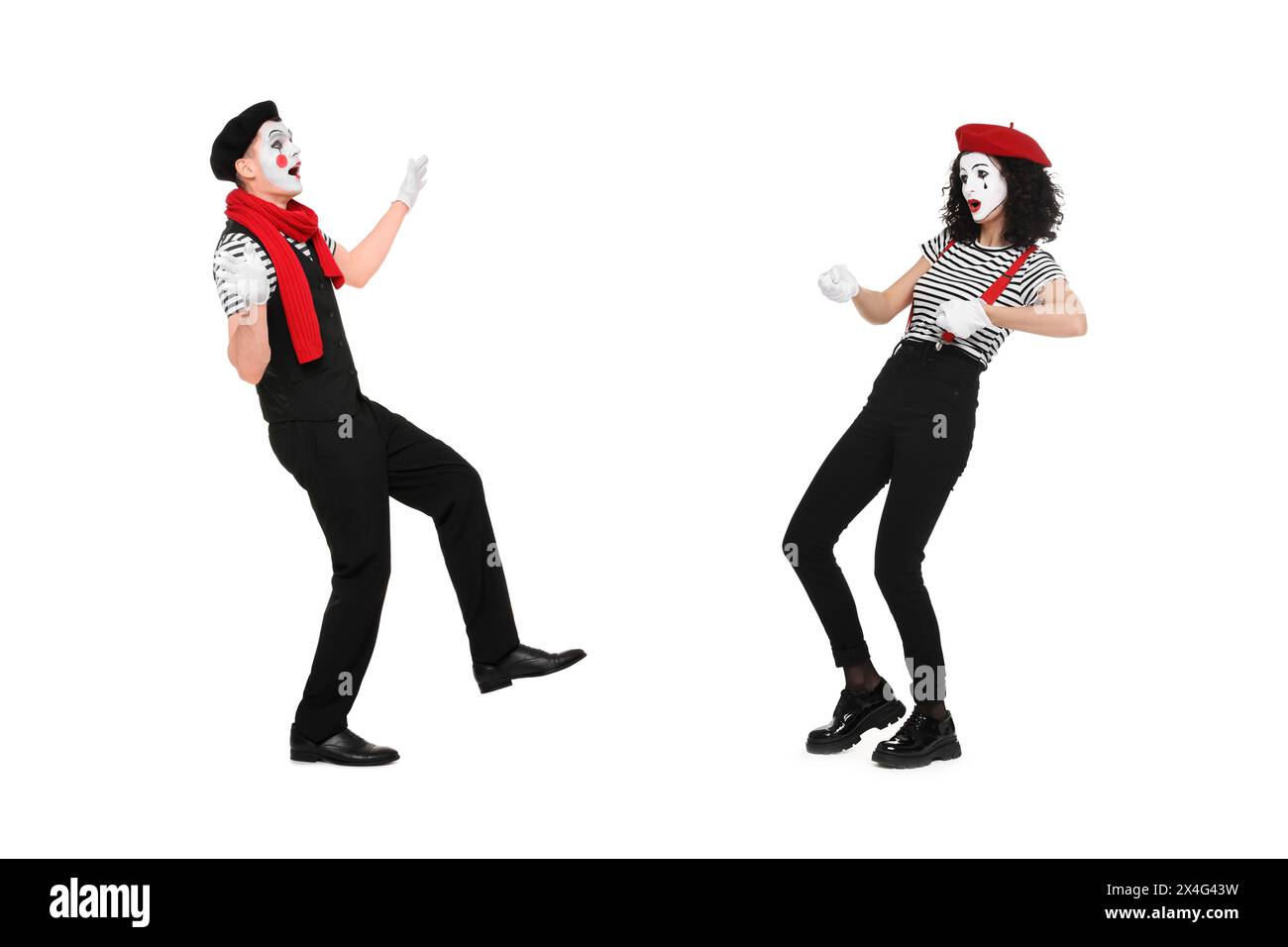 Two funny mimes performing on white background Stock Photo - Alamy