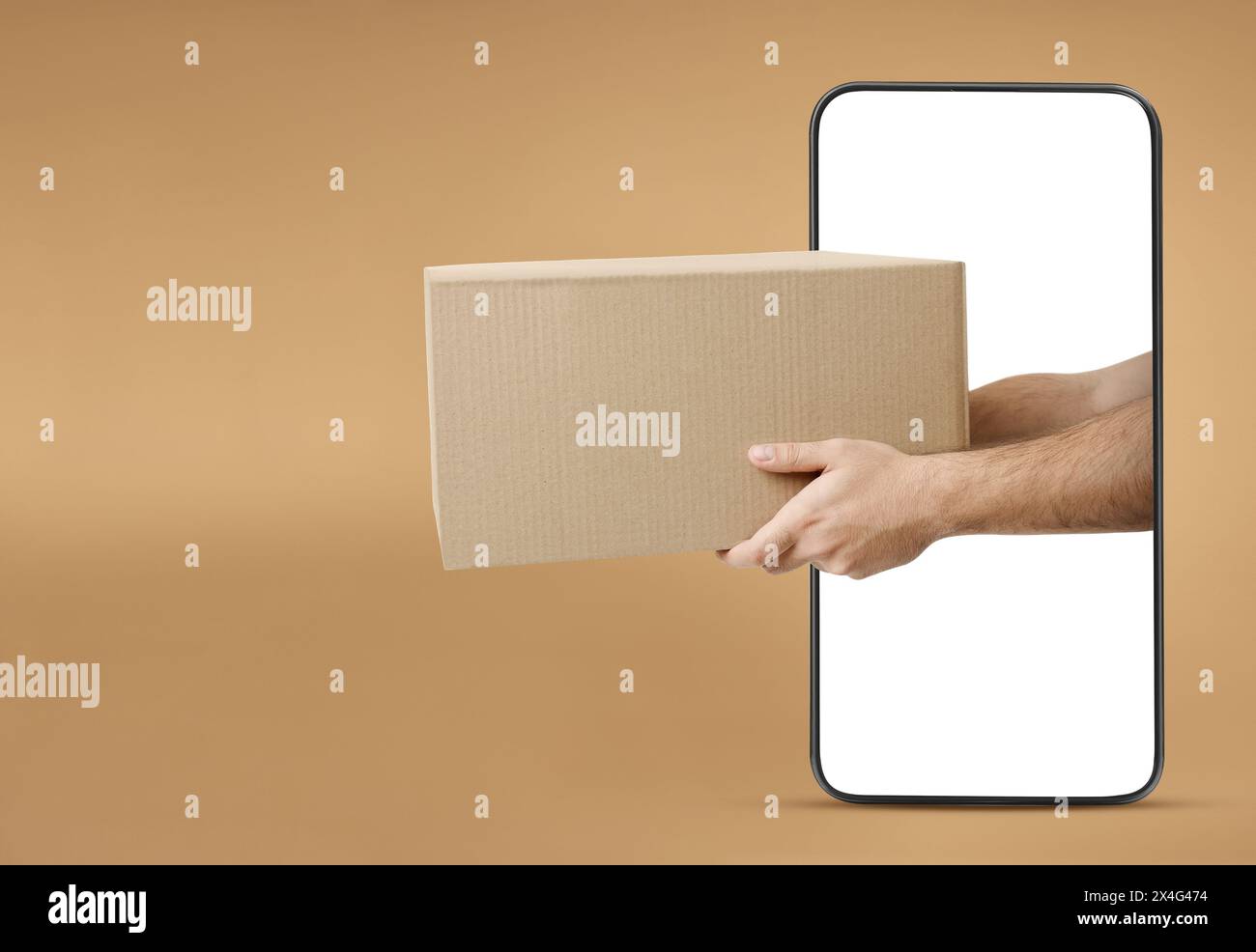 Courier passing parcel through smartphone on dark beige background ...