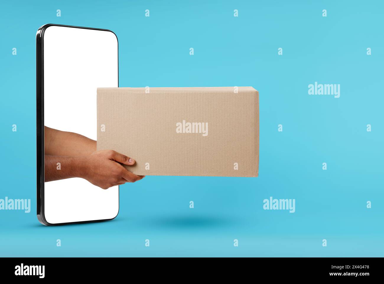 Courier passing parcel through smartphone on light blue background ...