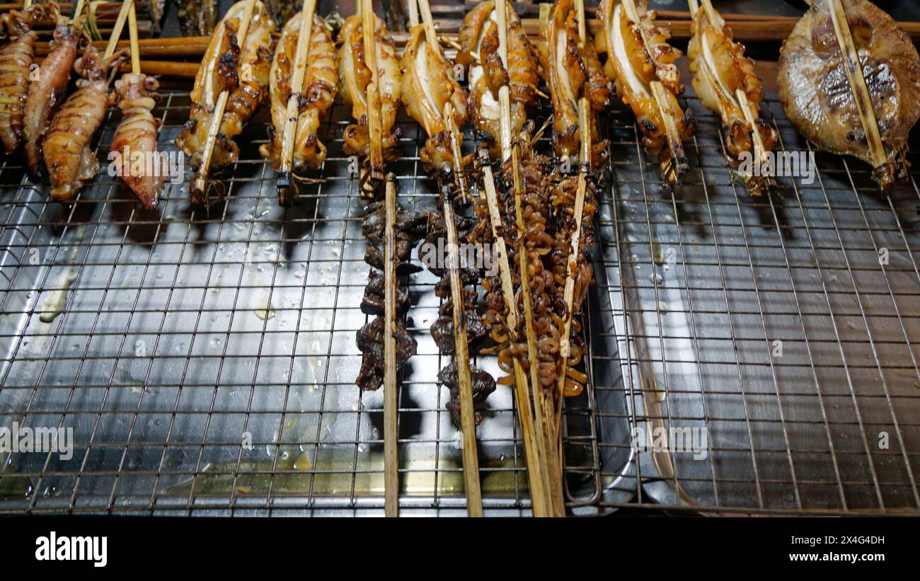 tasty street food on the local market in kampot in cambodia Stock Photo ...