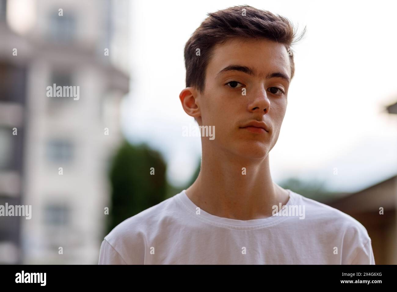 Portrait of teenager looking in camera Stock Photo - Alamy