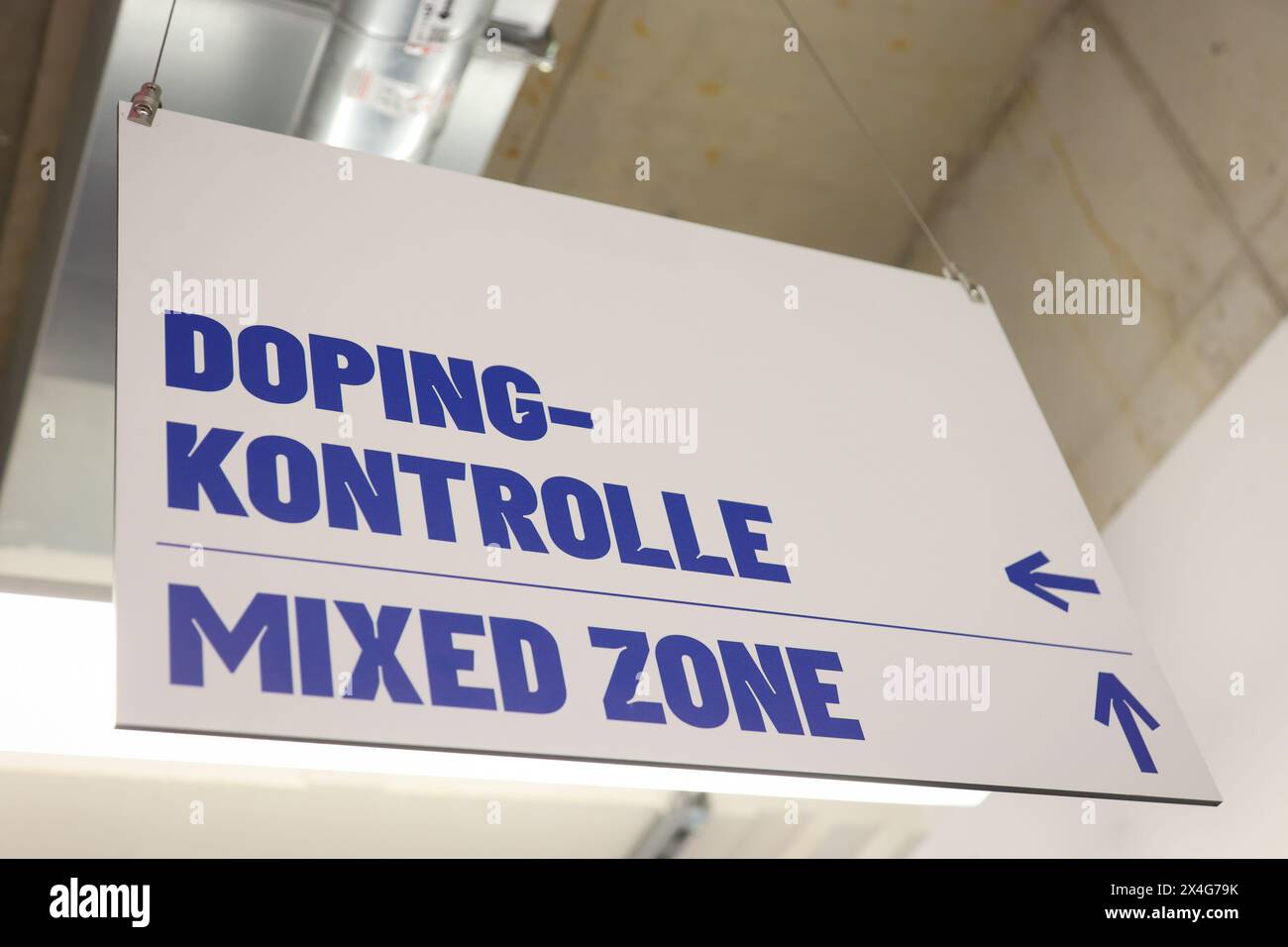 Signposts for doping control and the mixed zone in a football stadium ...