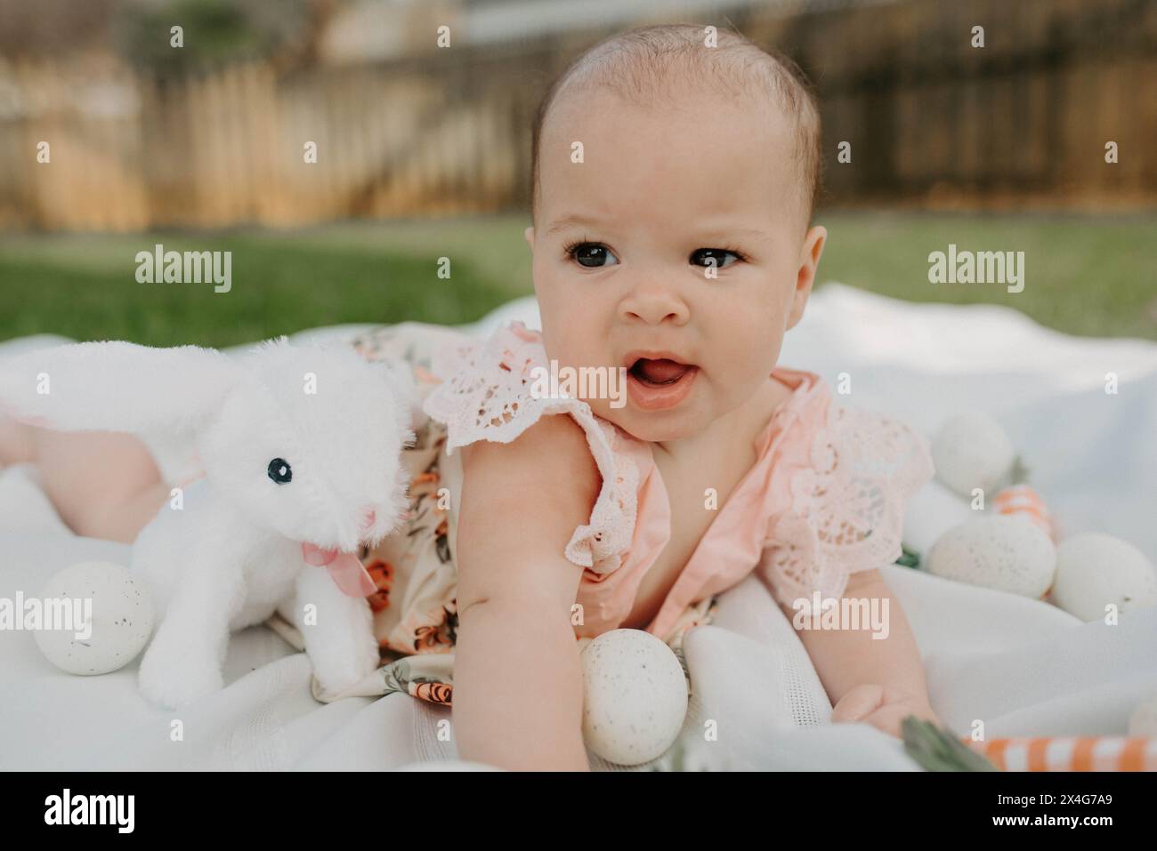 Playful Easter moments captured with baby’s bright smile Stock Photo ...