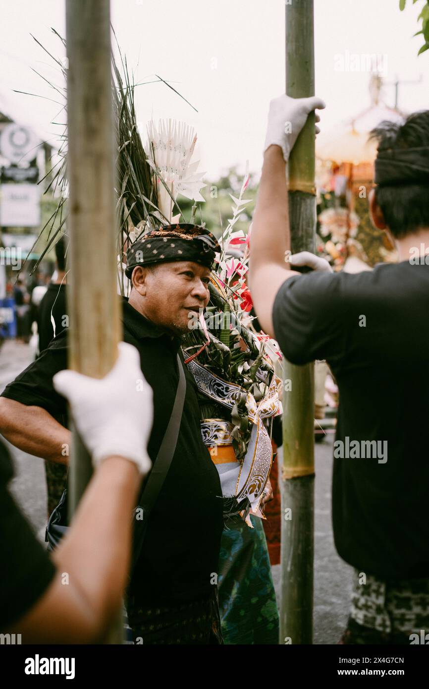Balinese men in traditional clothes at the ceremony Stock Photo - Alamy