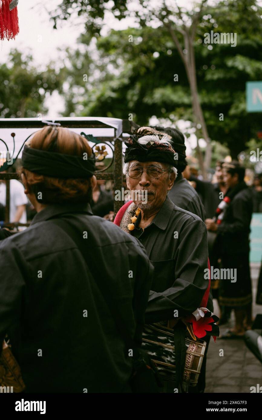 Balinese men in traditional clothes at the ceremony Stock Photo - Alamy