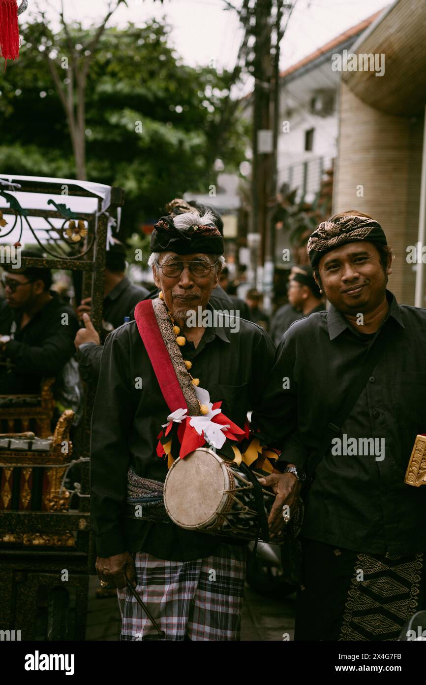 Balinese men in traditional clothes at the ceremony Stock Photo - Alamy