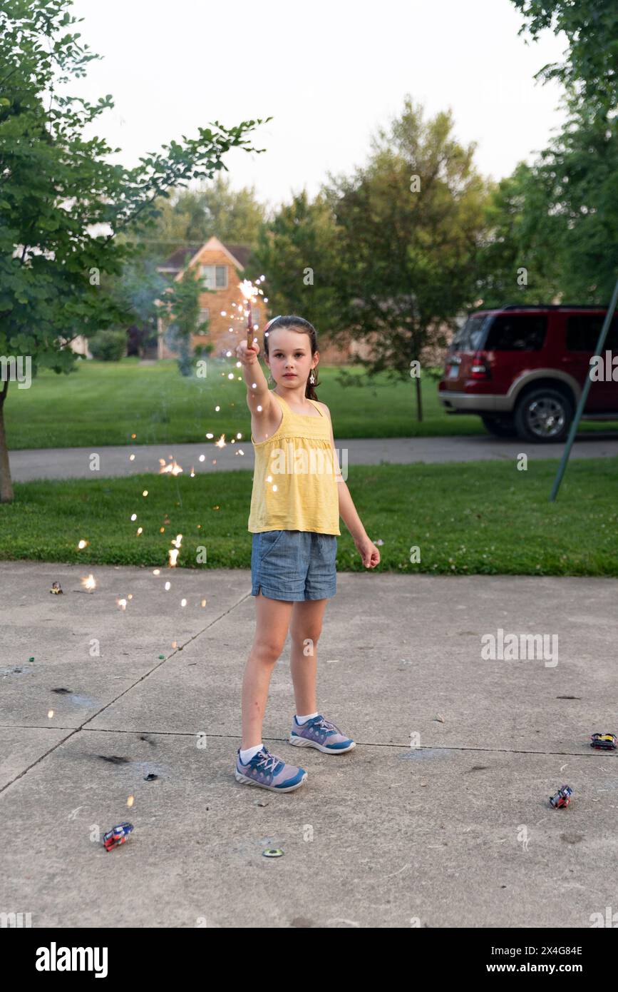 Fireworks child playing sparklers hi-res stock photography and images ...