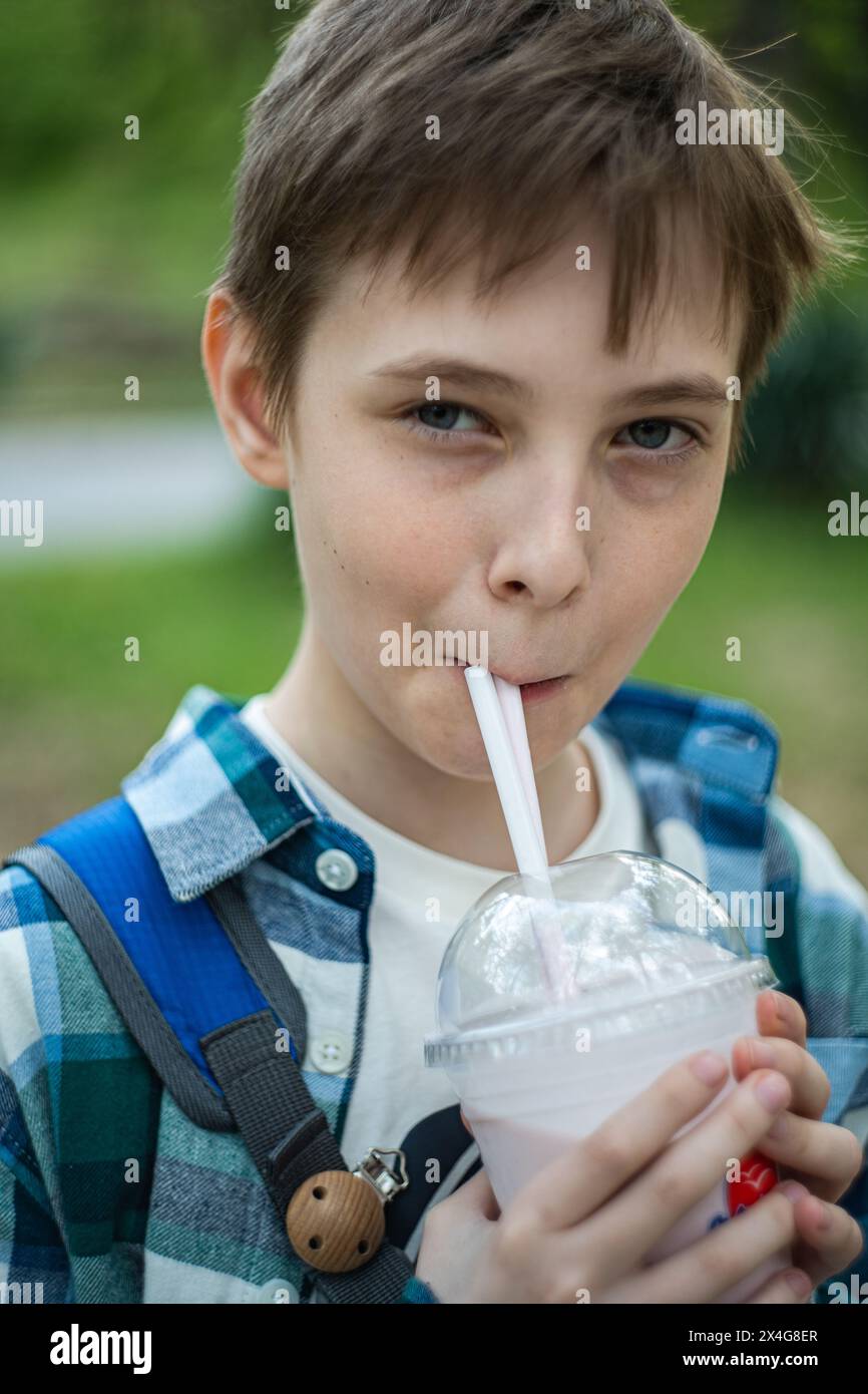 Nice boy having fun outdoor Stock Photo - Alamy