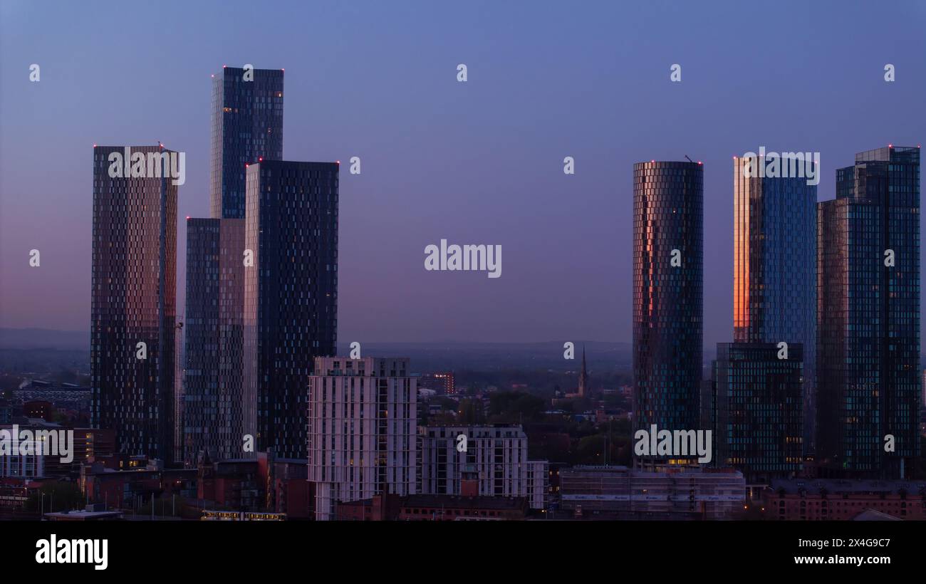Manchester Twilight skyline with illuminated skyscrapers Stock Photo ...