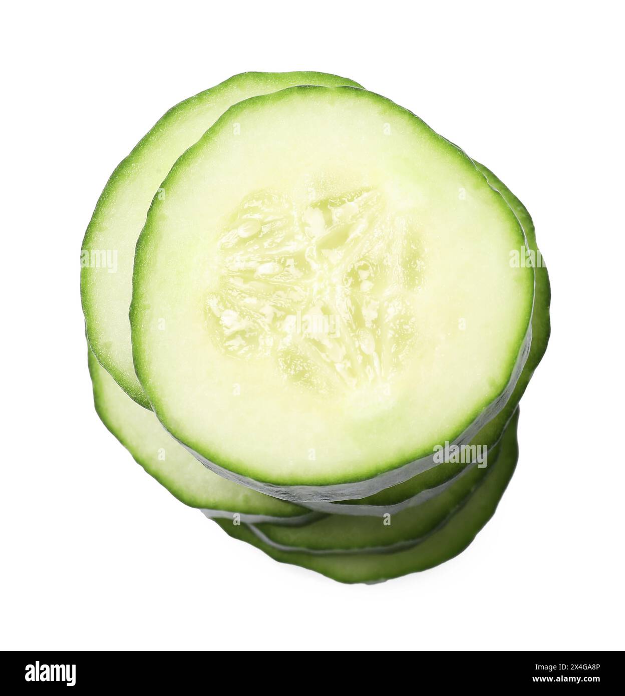 Stack of fresh cut cucumber isolated on white, top view Stock Photo - Alamy