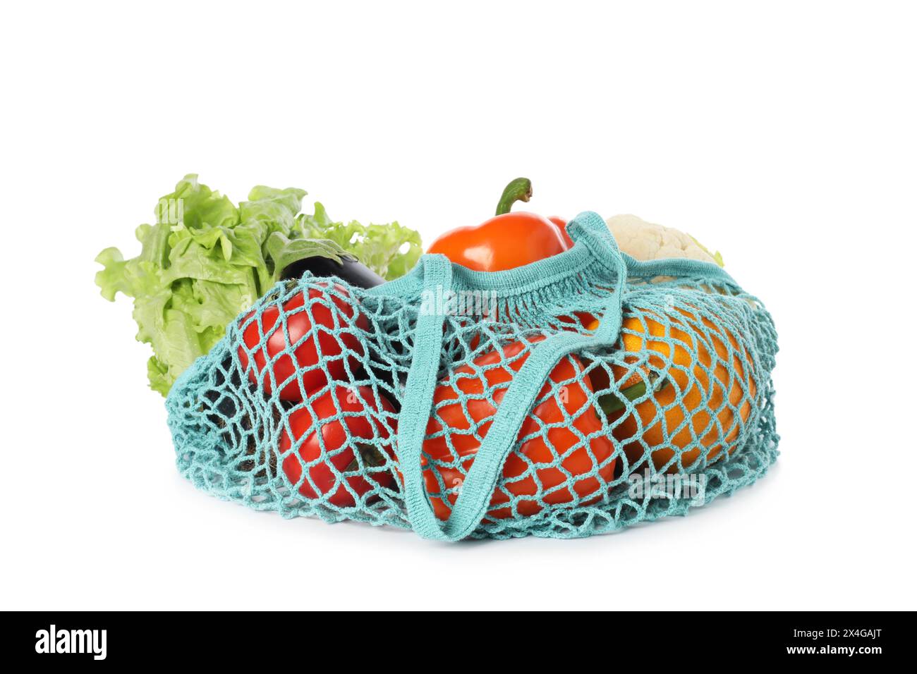 Fresh vegetables in string bag isolated on white Stock Photo - Alamy