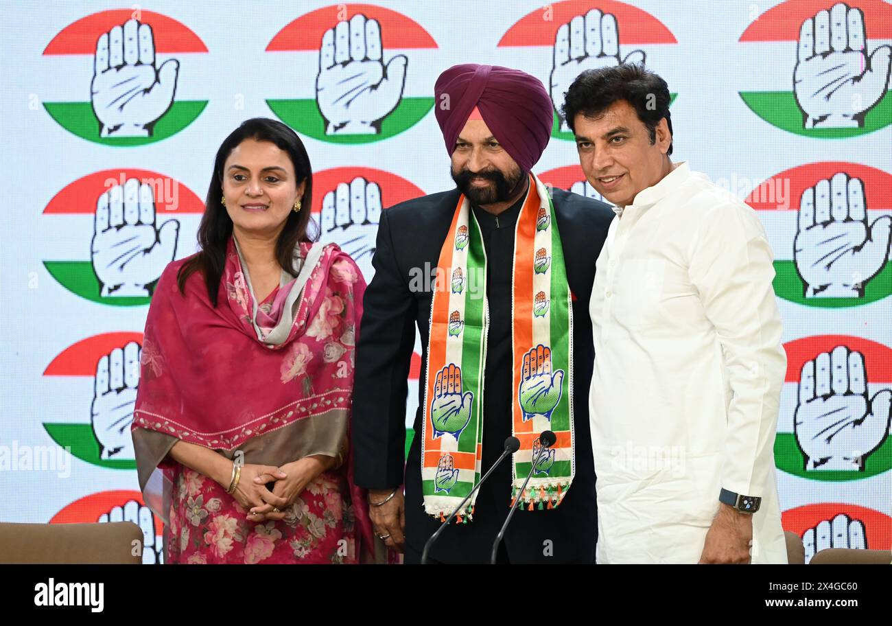 NEW DELHI, INDIA - APRIL 30: Congress leader Devender Yadav (R) with newly joined party leader ...