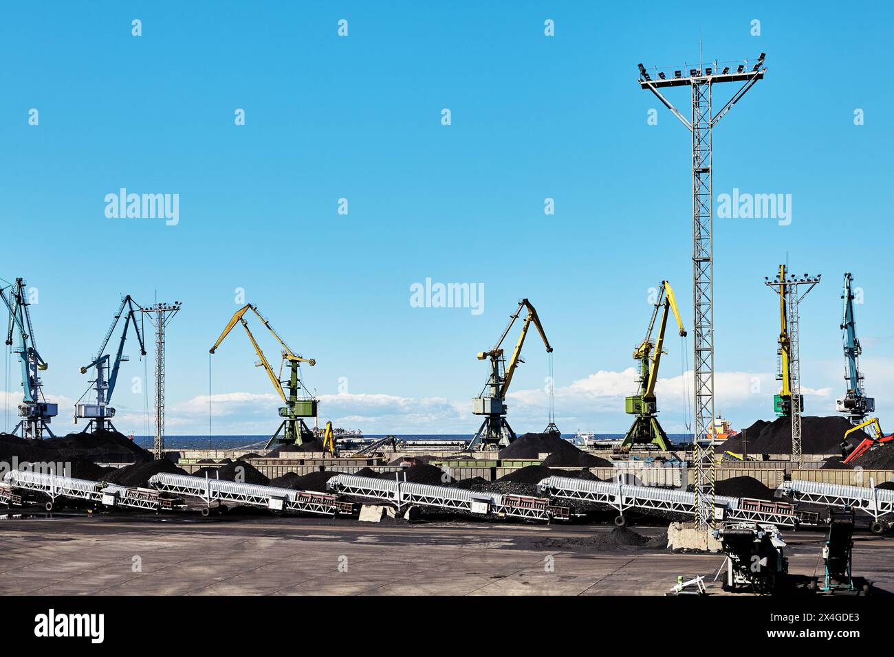 Maritime bulk terminal, mobile stacker conveyors, located one behind ...