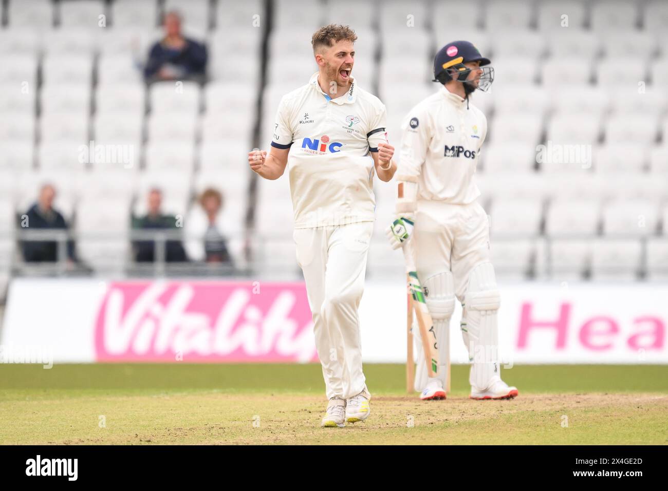 Ben Coad of Yorkshire celebrates taking the wicket of Eddie Byrom of ...