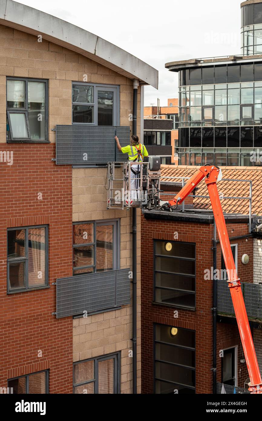 Worker operates platform repair hi-res stock photography and images - Alamy