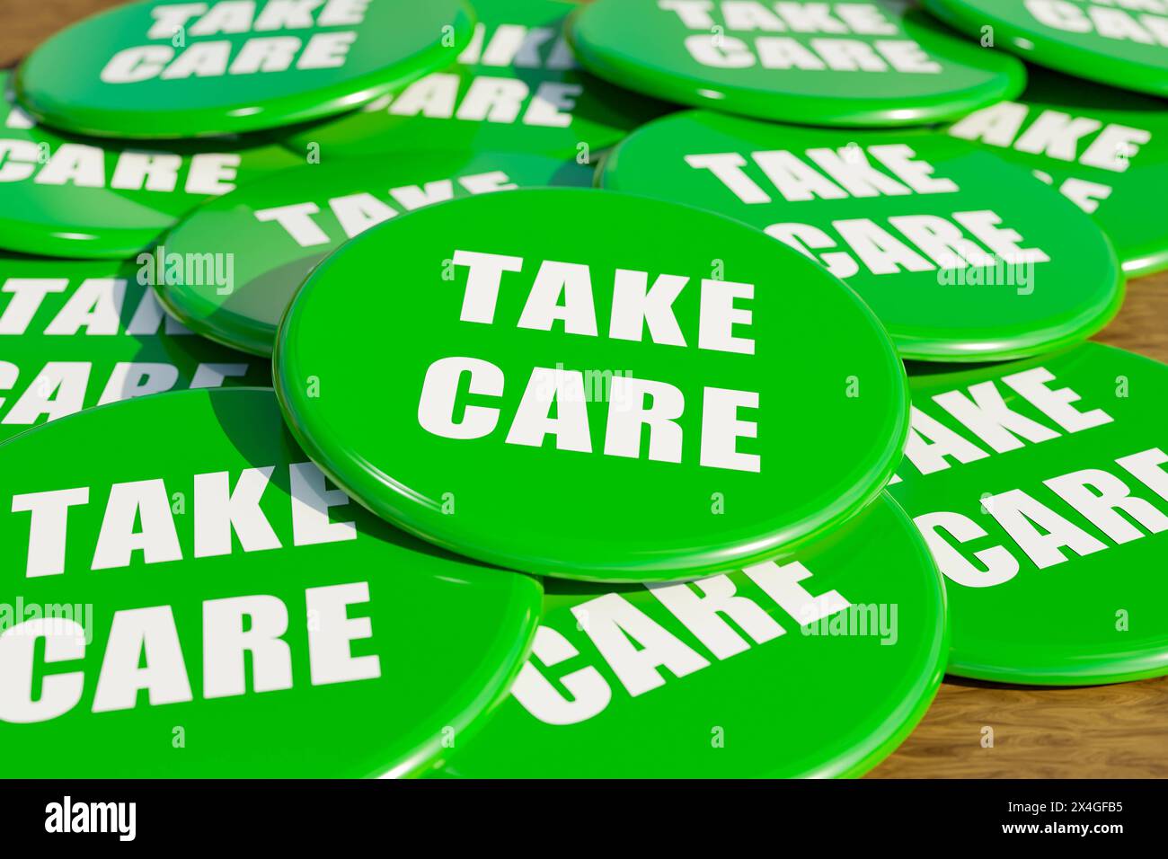 Take care. Take care. Green badges laying on the table with the message ...
