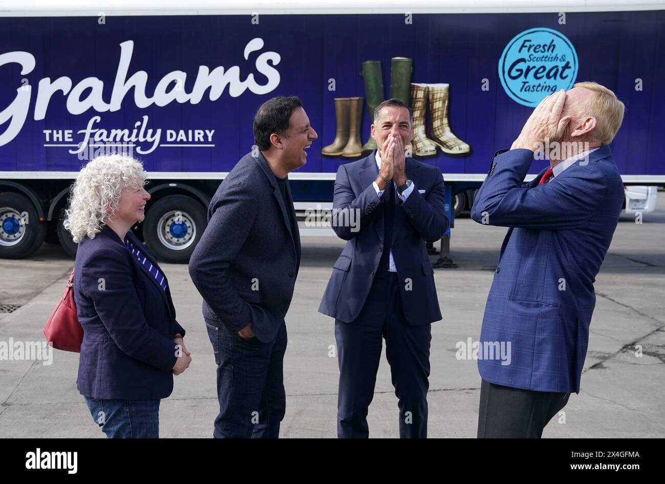 Scottish Labour leader Anas Sarwar chats with Robert Graham snr (r) and ...