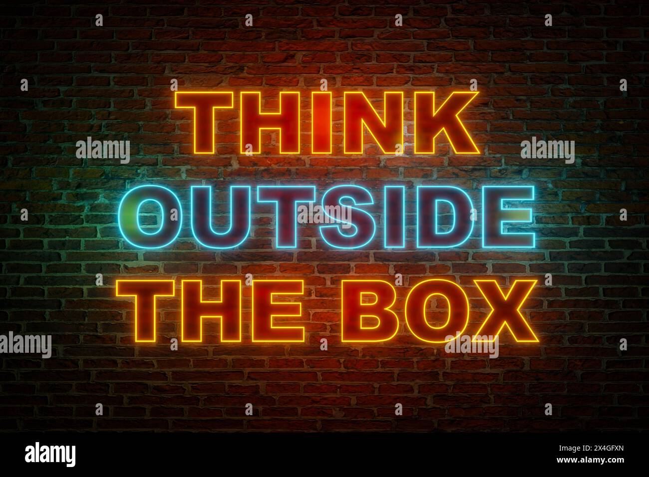 Think outside the box. Think outside the box. Brick wall at night with ...