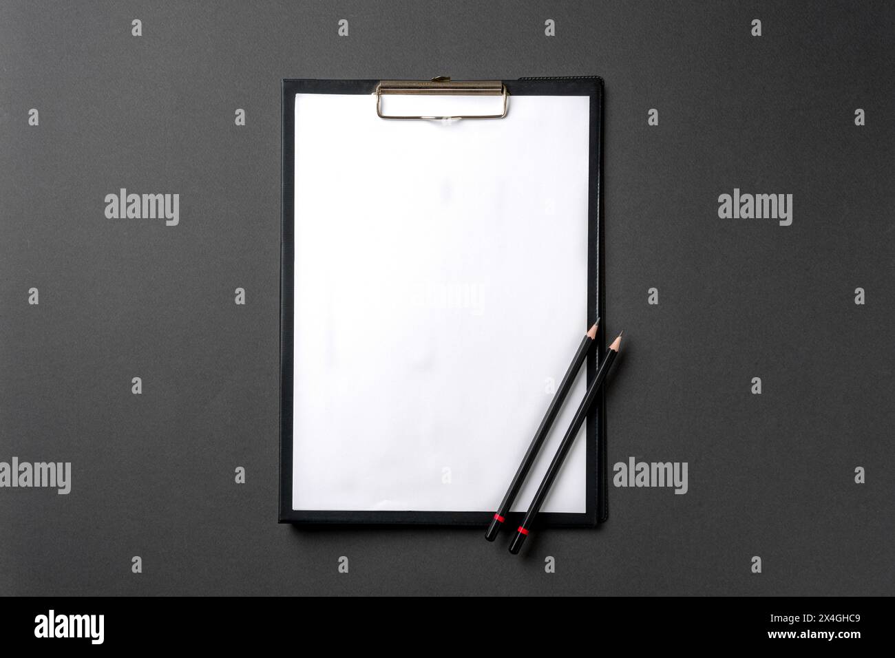 Blank A4 paper attached to the clipboard and pencil on it Stock Photo ...