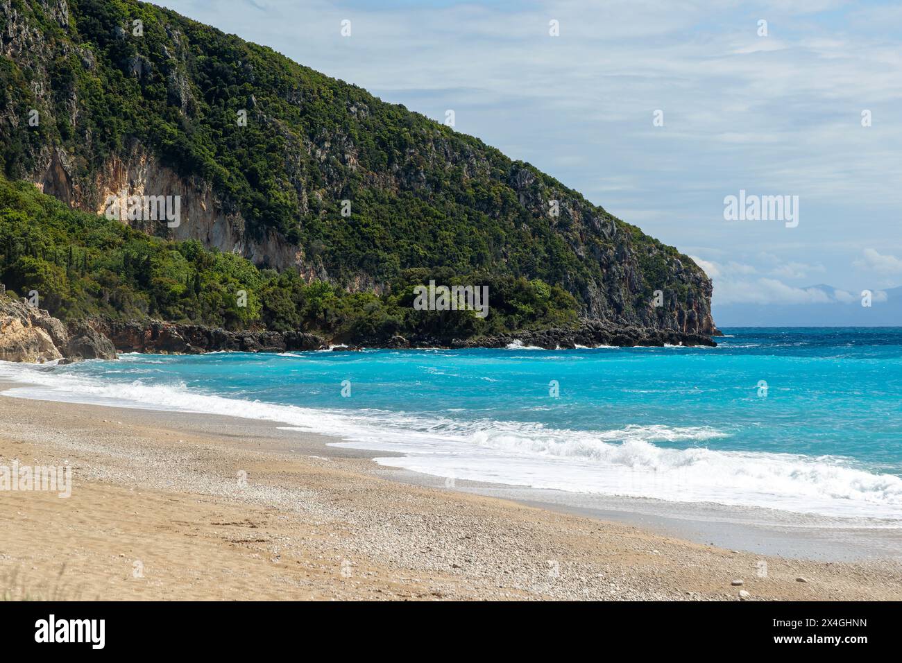 Coastal landscape of blue turquoise water of Ionian Sea, rocky headland ...