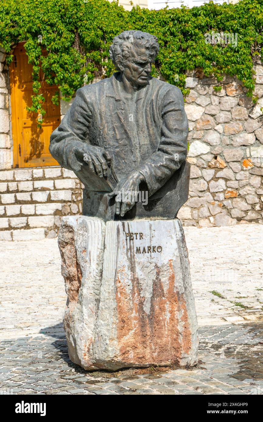 Sculpture statue of writer Petro Marko 1913-1991 in his home village of Dhermi, Albania, Europe ...