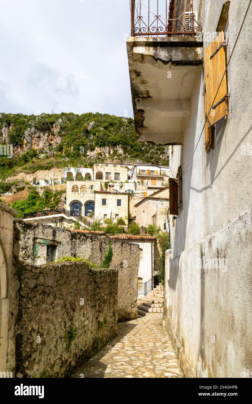 Alleyway and houses in traditional Greek architecture in village of ...