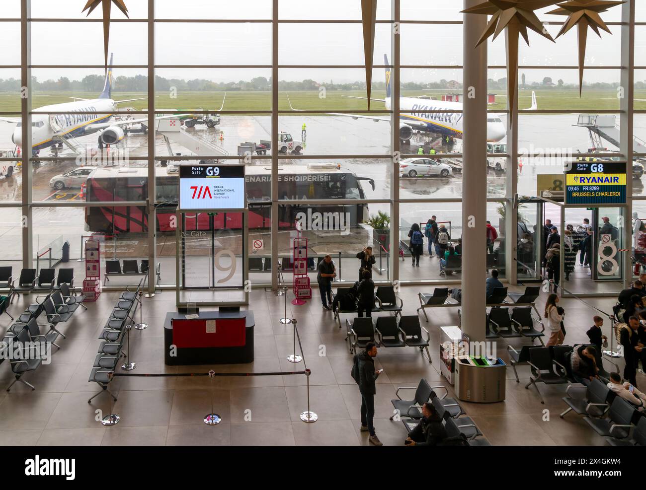 Departure lounge aircraft boarding area inside Tirana International ...