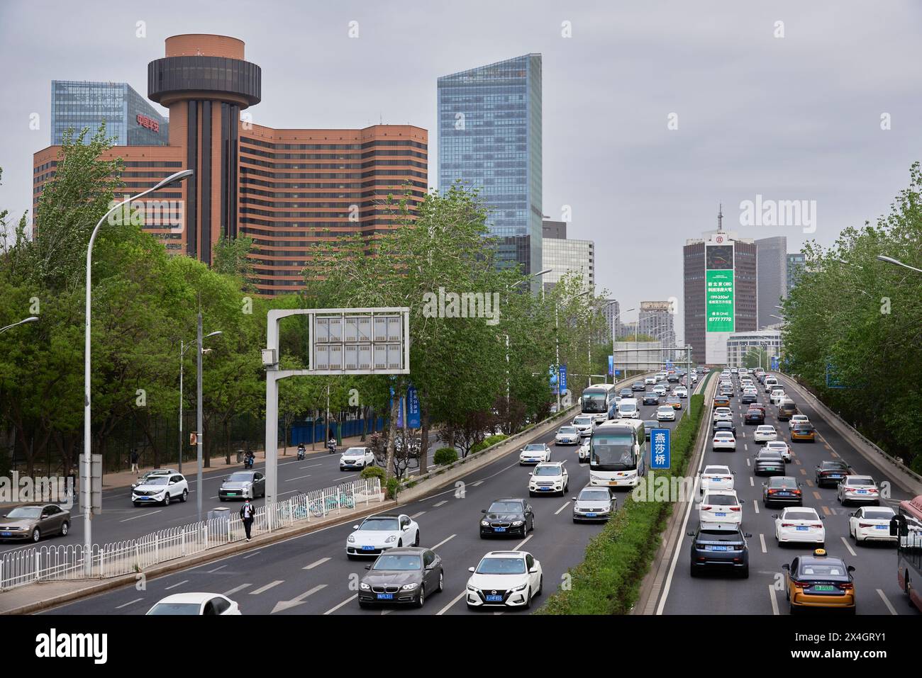 Traffic on 3rd Ring Road East (San Huan Lu), one of the main highways ...