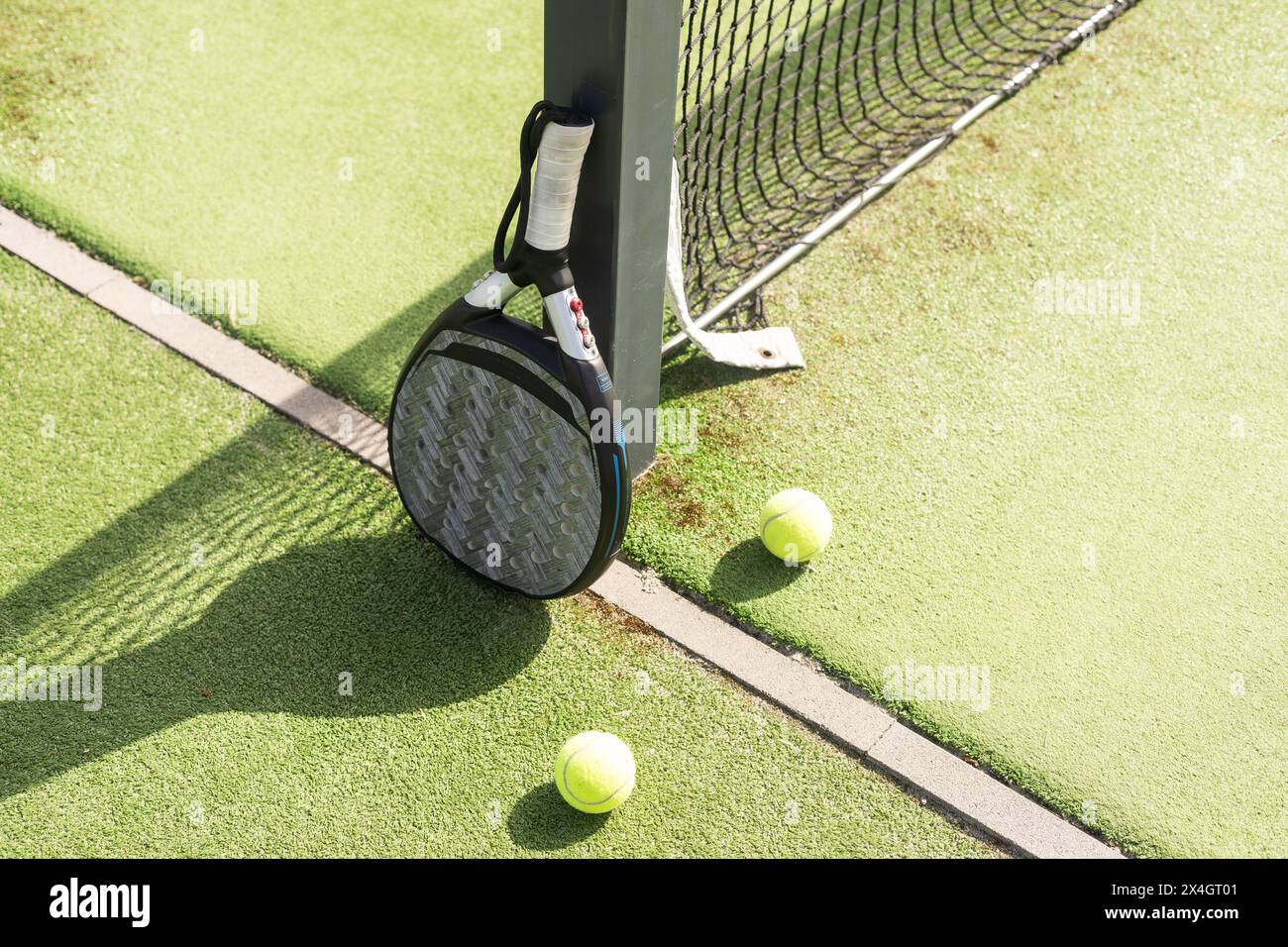 Paddle tennis racket and ball Stock Photo - Alamy