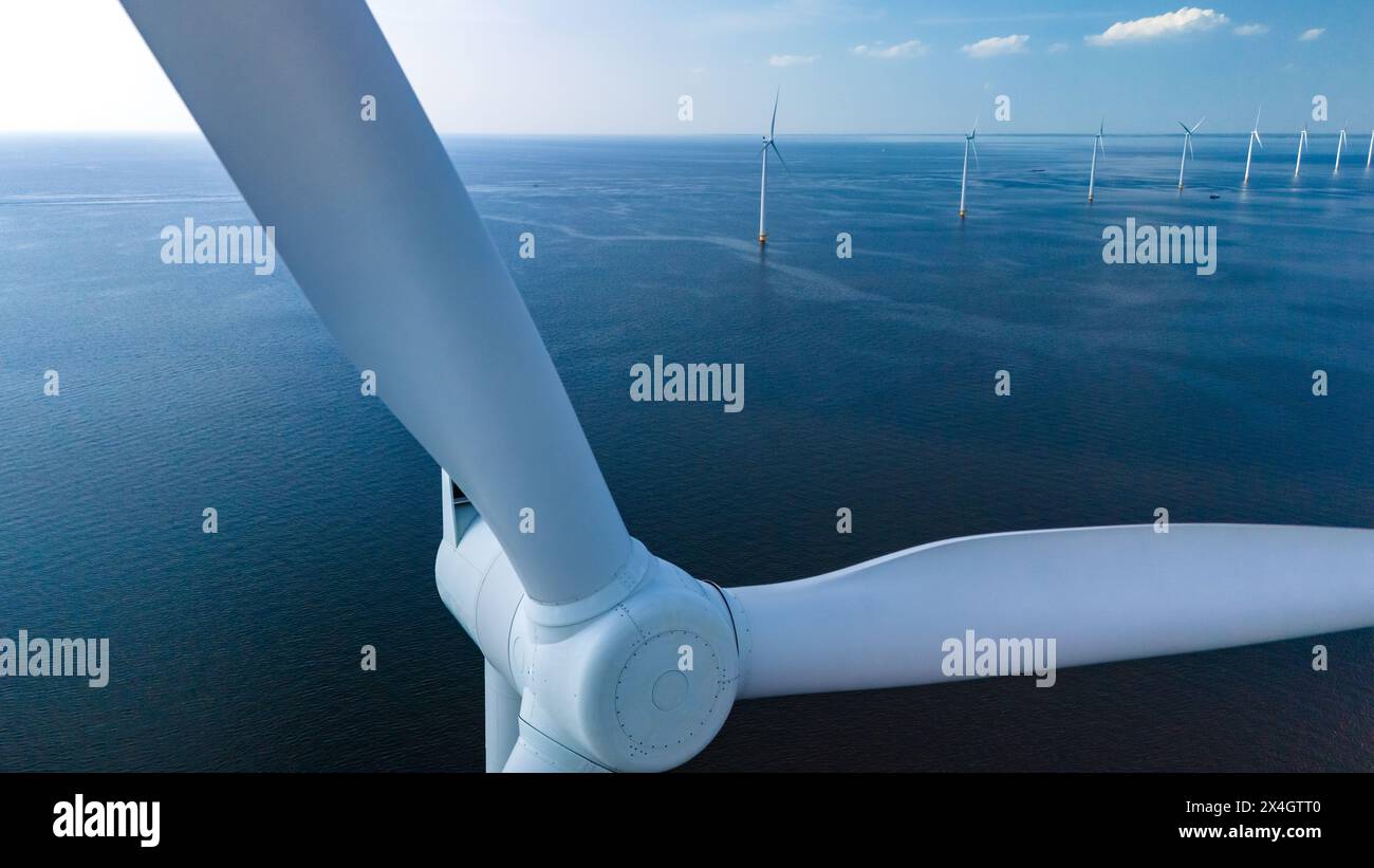 A mesmerizing aerial perspective showcases the expansive wind farm in the Dutch waters of ...