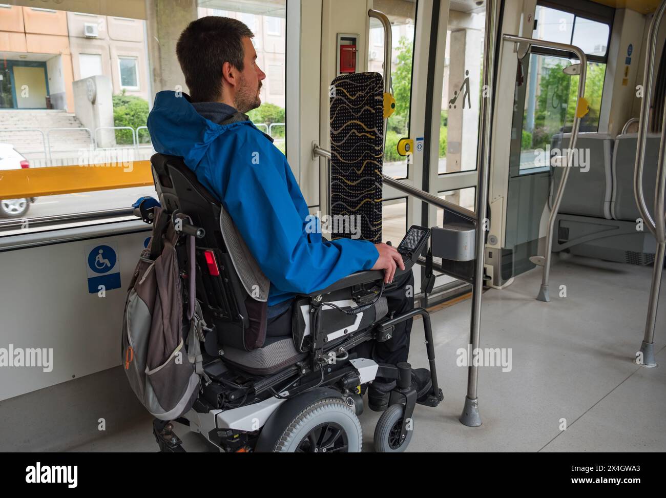 Man with disability with electric wheelchair on train. Inclusive and ...