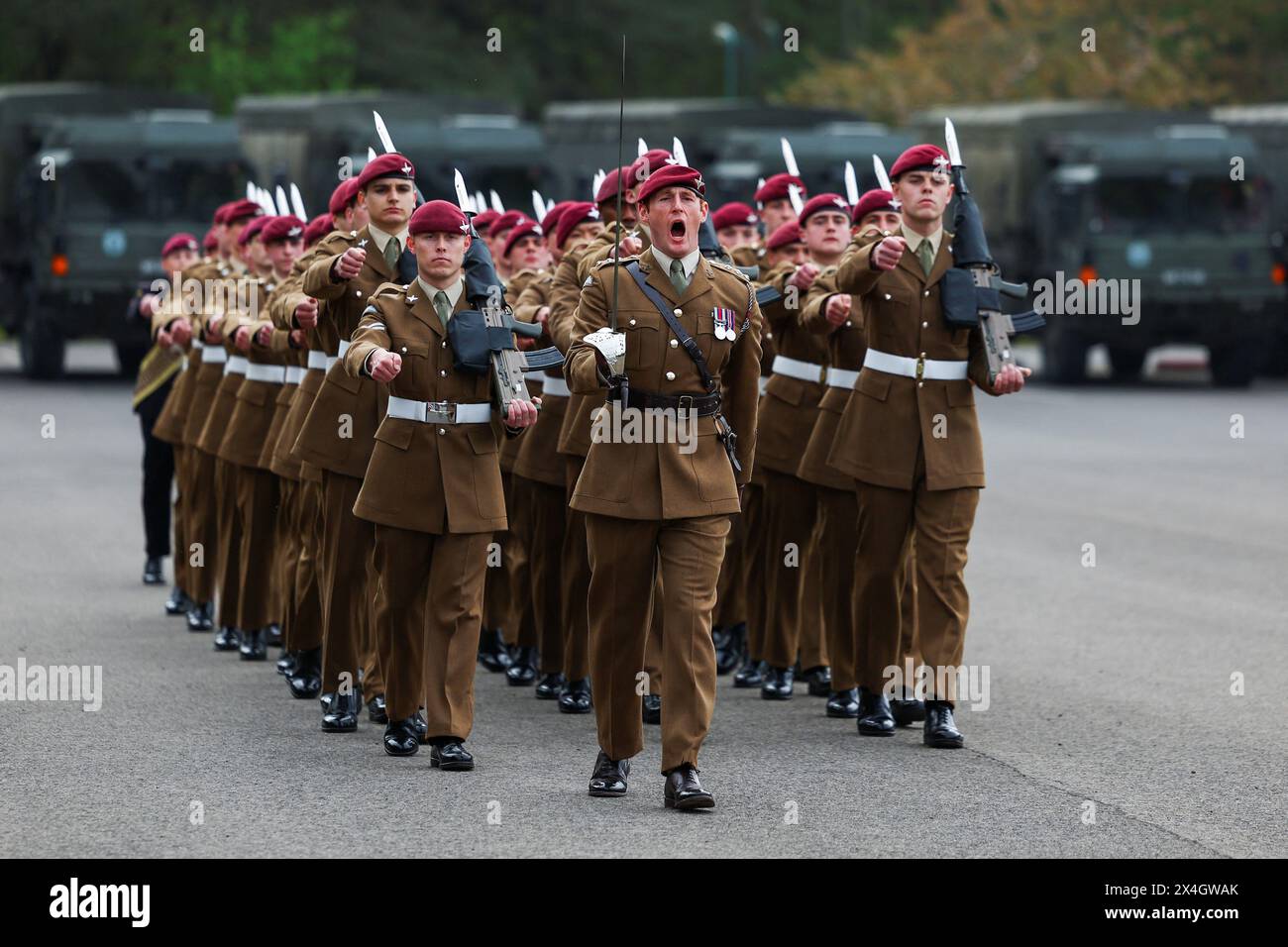 Members of the Passing Out Parade of the Parachute Regiment walk during ...