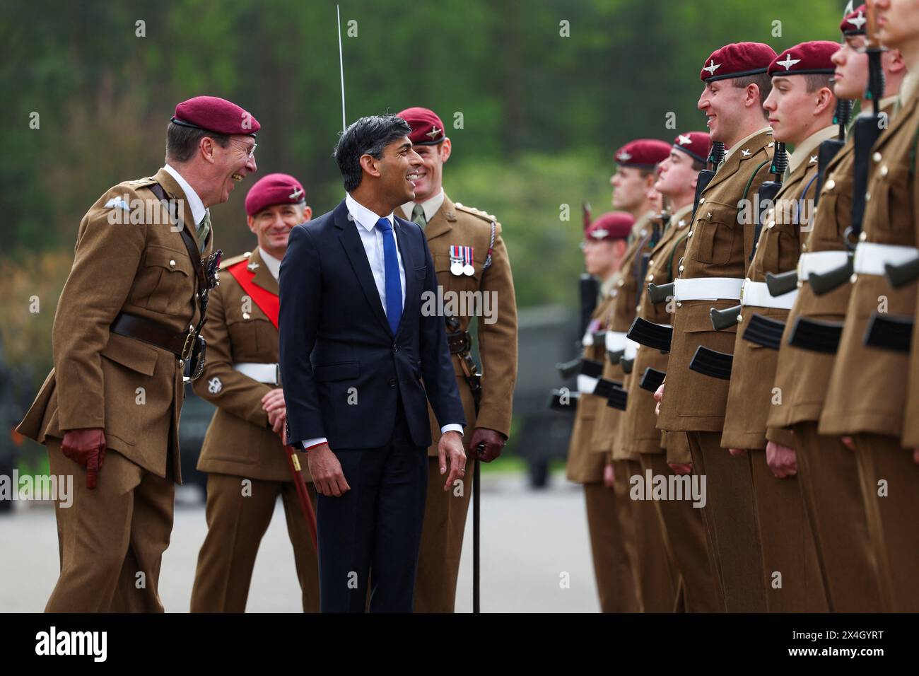 Prime Minister Rishi Sunak and Lieutenant General Andrew Harrison react ...