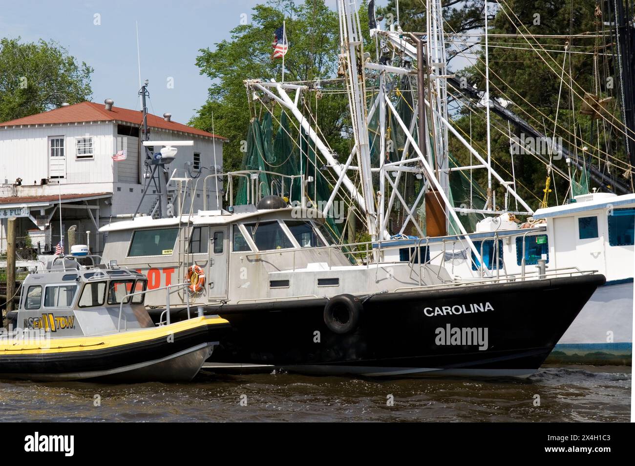 Traditional fishing boat docked at the historic waterfront in ...