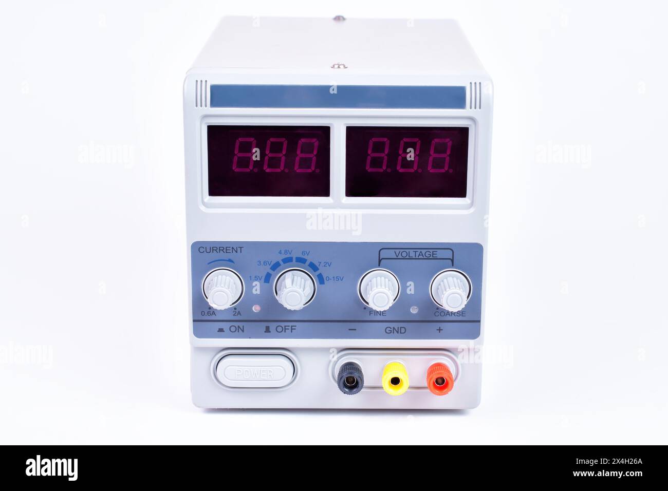 Close-up of a direct current power supply unit isolated on white ...