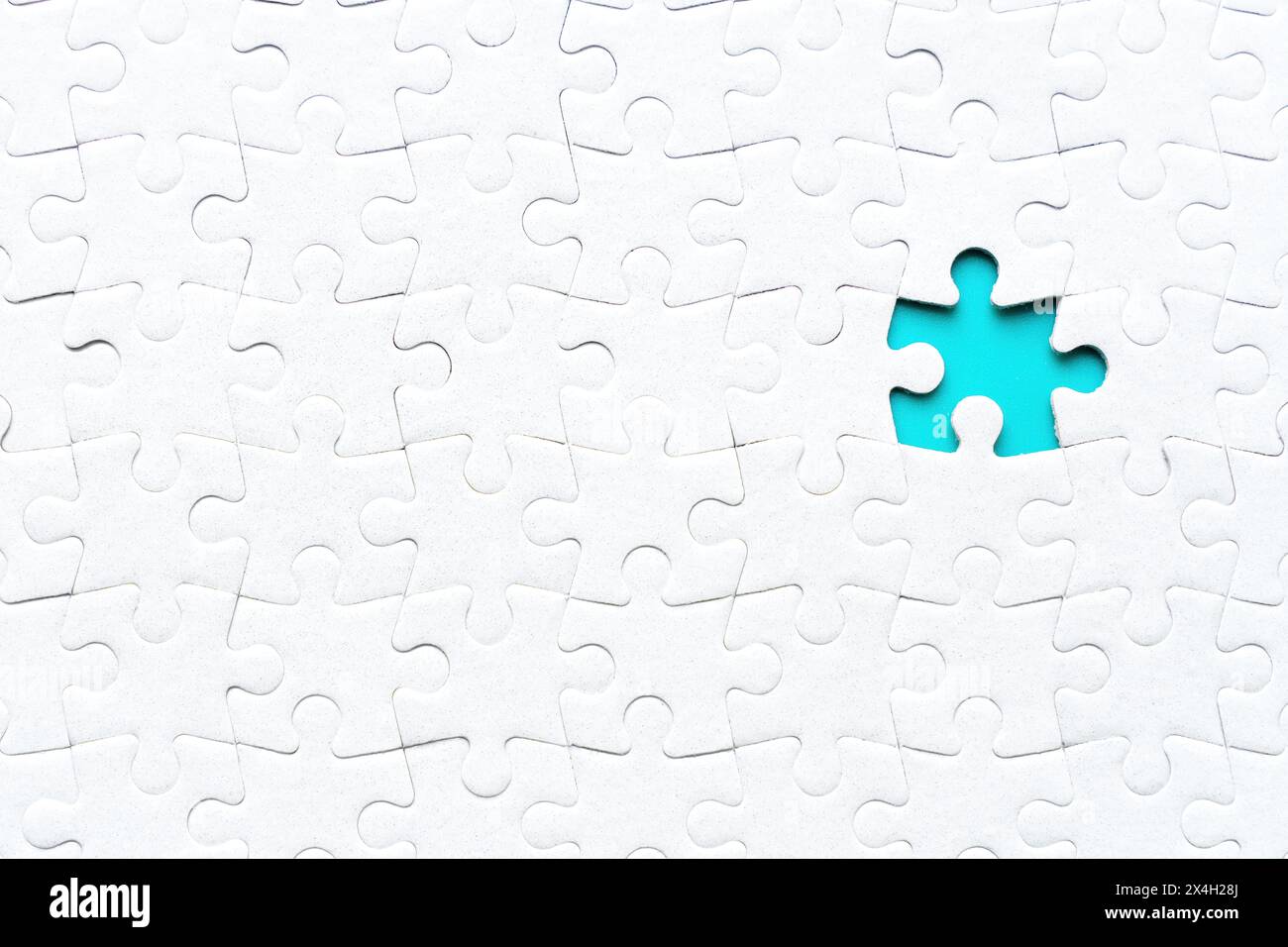 Mockup of a fully assembled puzzle with a single missing element ...