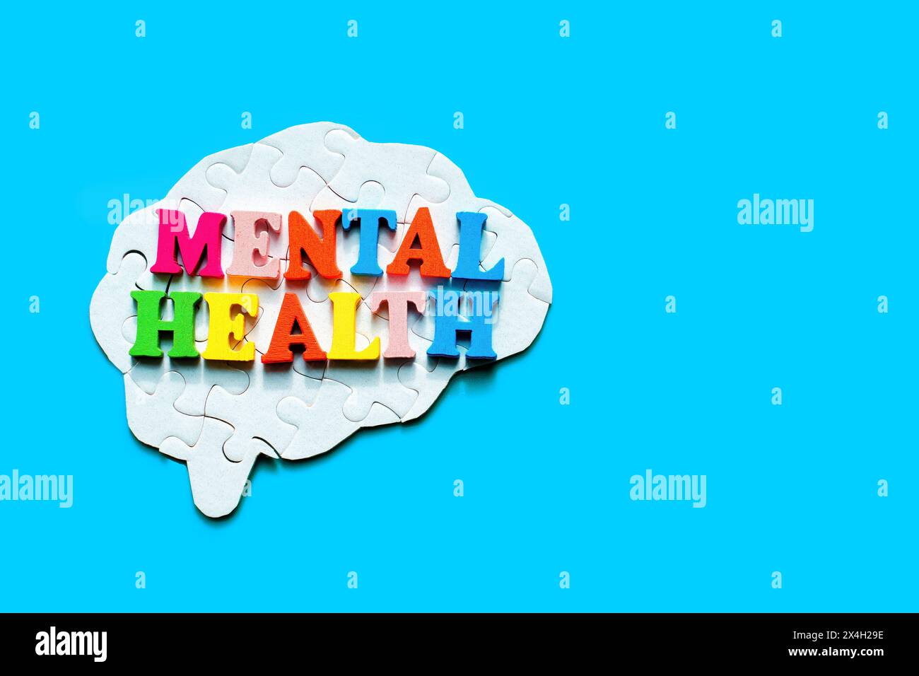 Wording "Mental Health" made of colorful wooden letters placed on top ...