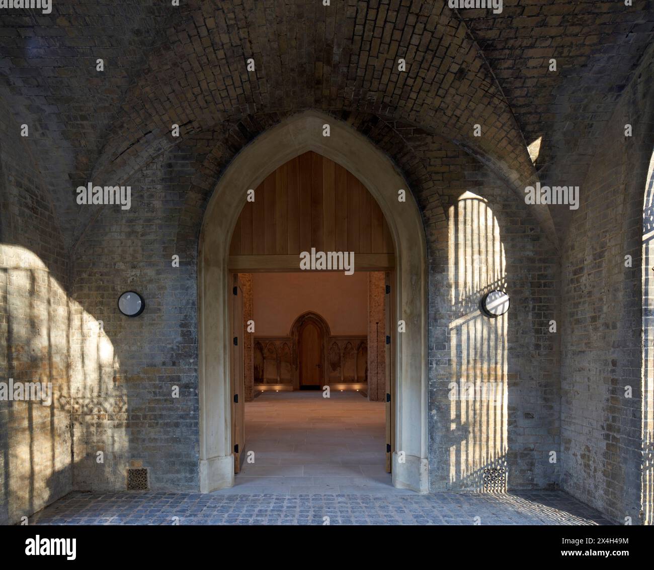 Masonry, gothic arch and sunlight reflection. Abney Park Chapel, London ...