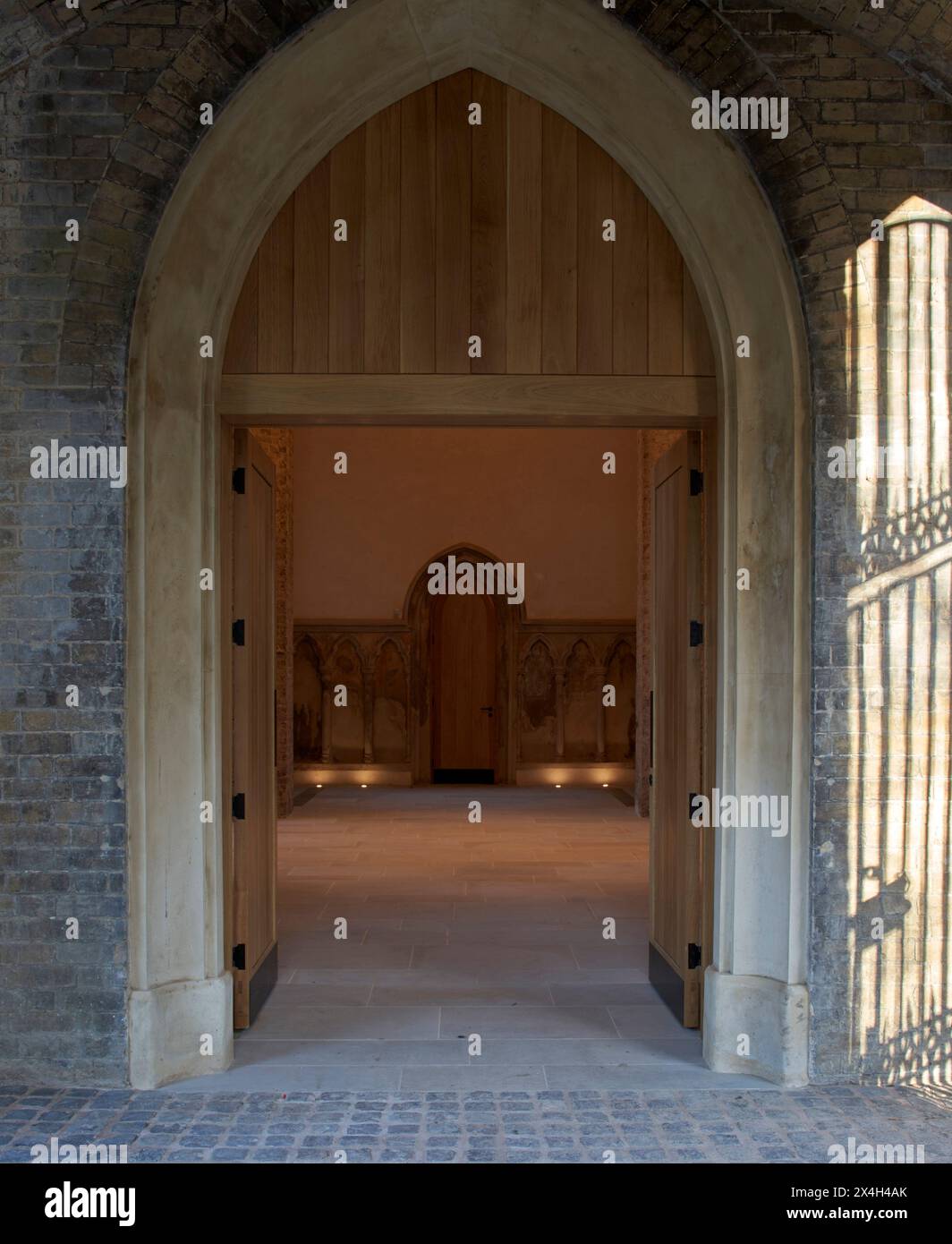 Masonry, gothic arch and sunlight reflection. Abney Park Chapel, London ...