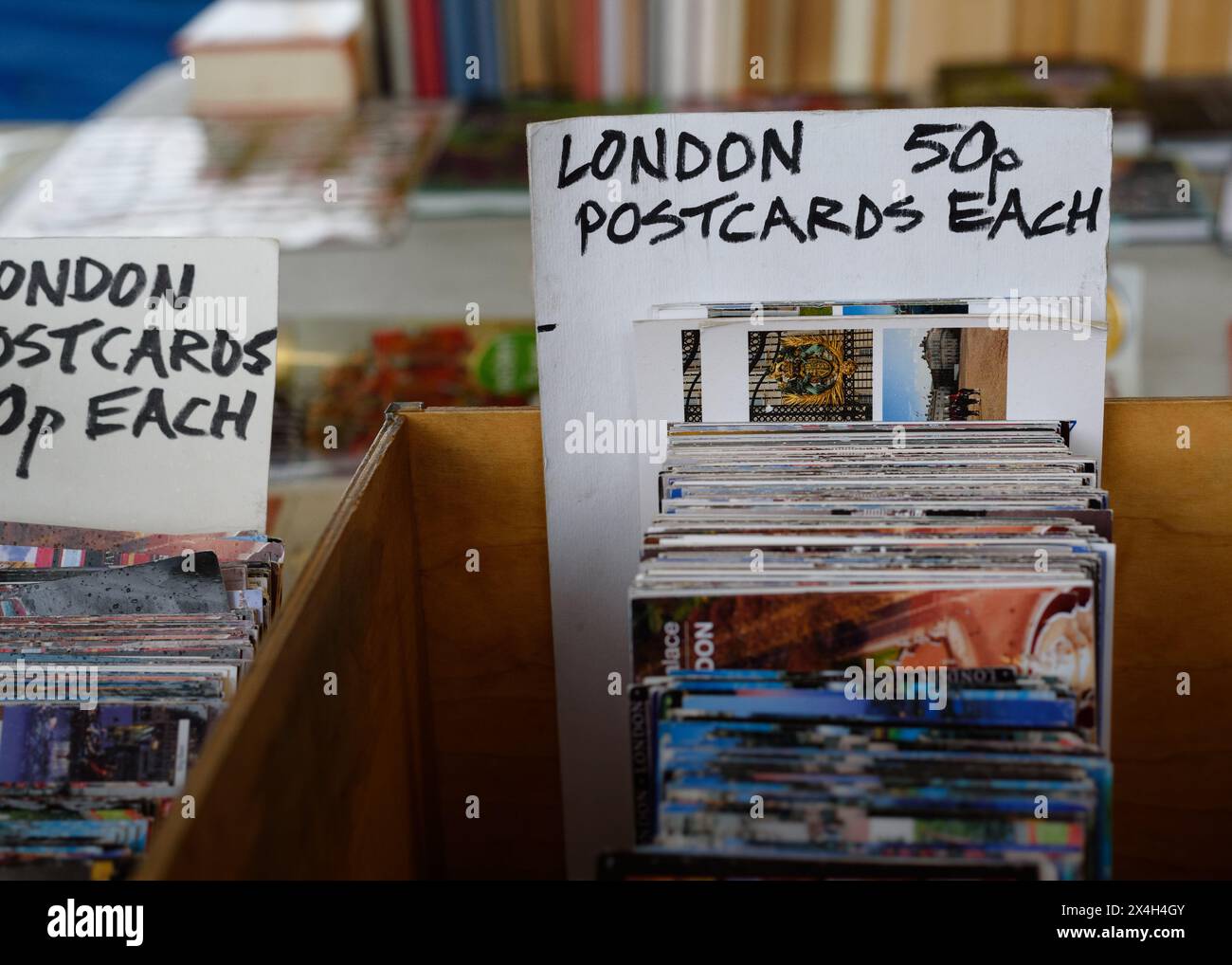 Old postcards for sale at a market stall in London Stock Photo - Alamy