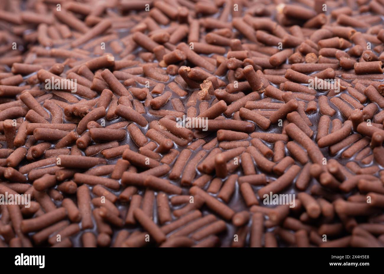 chocolate sprinkles on the cake Stock Photo - Alamy