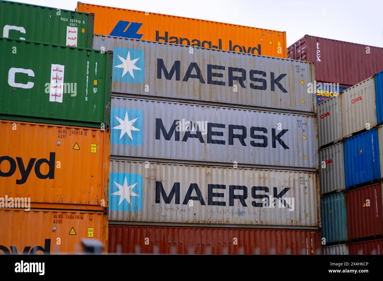 Danish Moller-Mærsk Shipping containers largest shipping and logistics company stacked in port ...