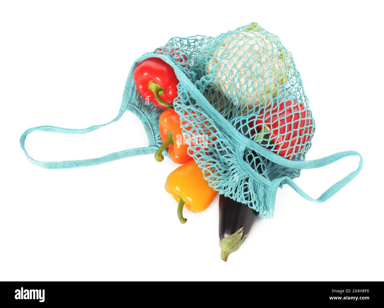 String bag with fresh vegetables isolated on white, top view Stock ...