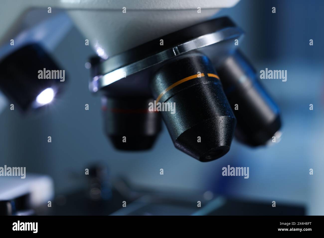 One microscope on blurred background, closeup view Stock Photo - Alamy