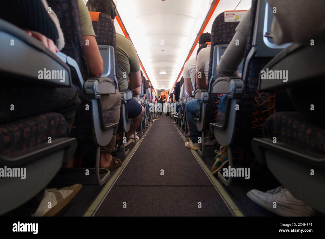 Passengers inside easyjet plane hi-res stock photography and images - Alamy