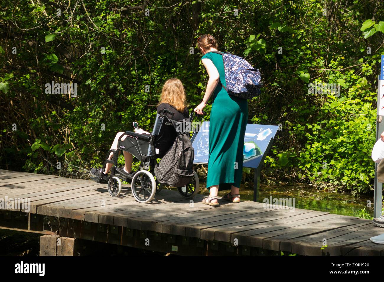 Disabled child teenager / girl kid aged 14 in a wheelchair & enjoying ...