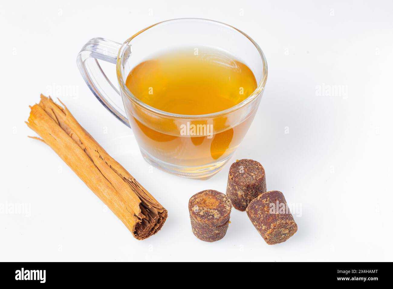 Piloncillo, ground piloncillo and piloncillo tea isolated on white ...