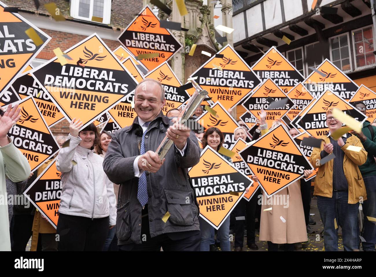 Liberal Democrat leader Sir Ed Davey, fires a confetti cannon as he ...